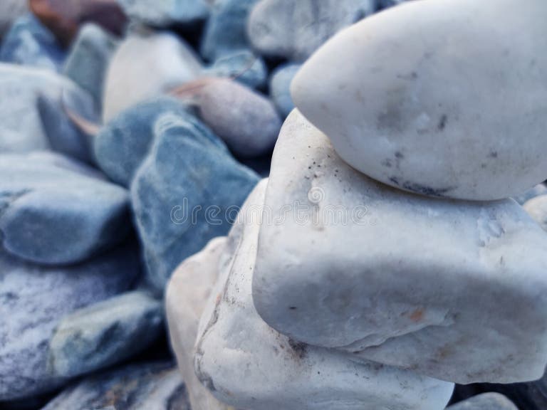 Stack of Triangular Stones.Group of White and Colorful Stones.Pebble ...