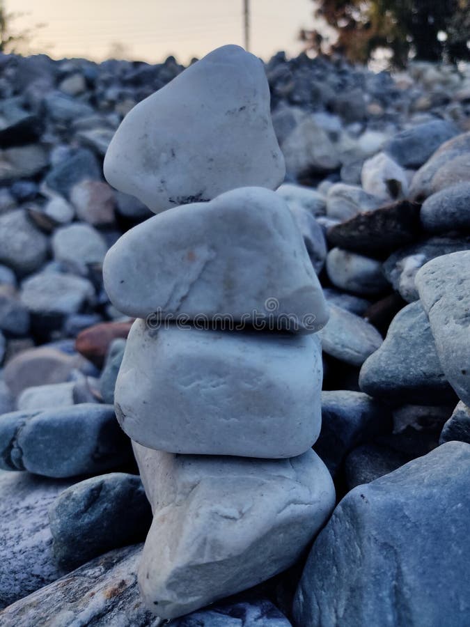 Stack of Triangular Stones.Group of White and Colorful Stones.Pebble ...