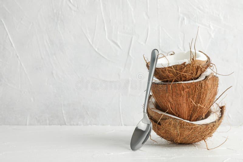Stack Tropical Coconut with Spoon on Wooden Table Stock Image - Image ...