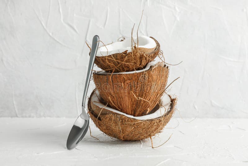 Stack Tropical Coconut with Spoon on Wooden Table Stock Image - Image ...