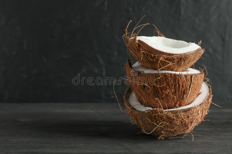 Stack Tropical Coconut on Wooden Table Against Black Background Stock ...
