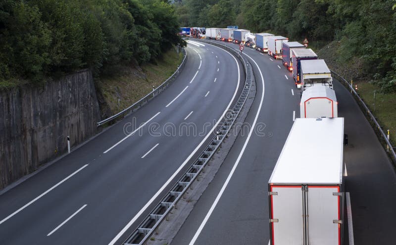 Stack of Trucks in a Long Traffic Jam on the Freeway at Night Stock ...