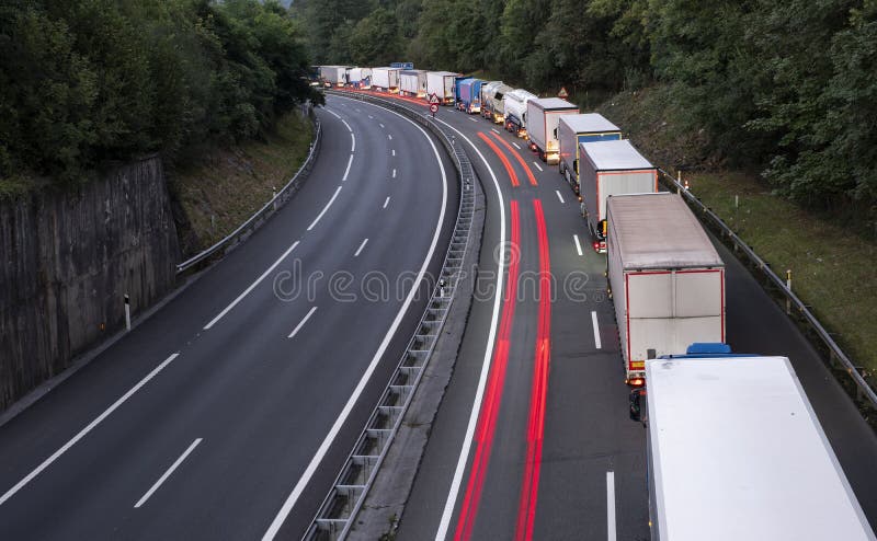Stack of Trucks in a Long Traffic Jam on the Freeway at Night Stock ...
