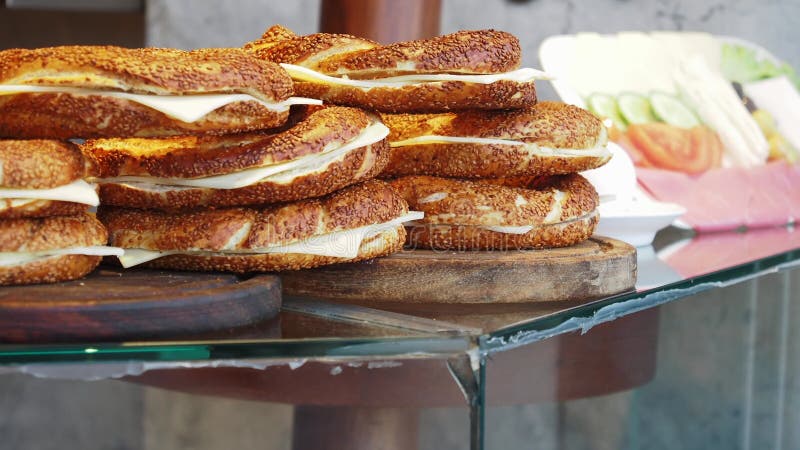 Stack of Turkish Bagel Simit with Cheese Stock Video - Video of board ...