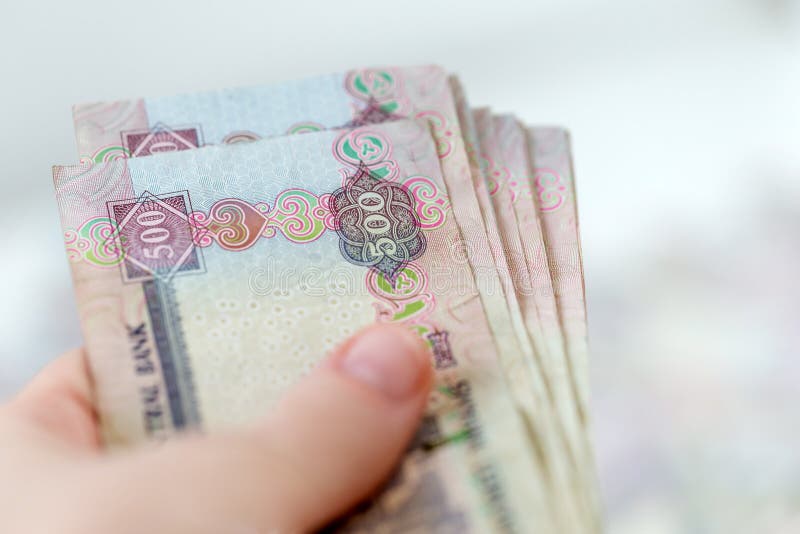 Stack of UAE Dirhams in Woman`s Hands. Closeup. Stock Image - Image of ...