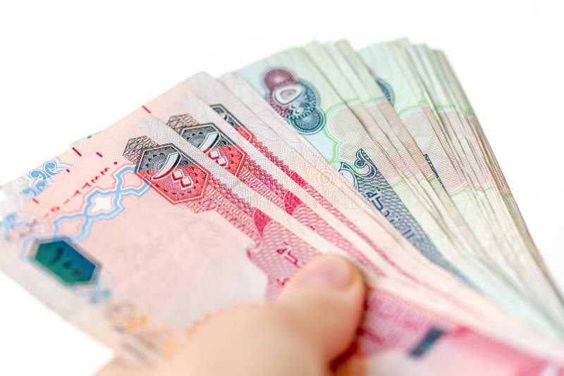 Stack of UAE Dirhams in Woman`s Hands, Paper Money, Close Up. Stock ...