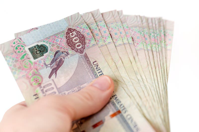 Stack of UAE Dirhams in Woman`s Hands, Paper Money, Close Up. Stock ...