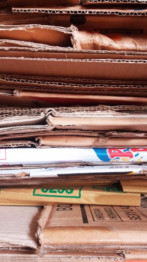 Stack of Unfolded Brown Paper Box Editorial Photo - Image of floor ...