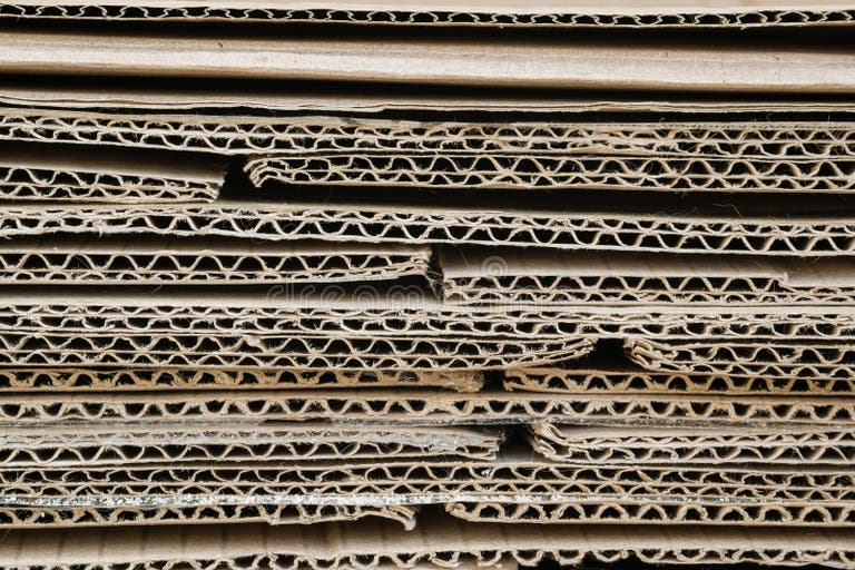 A Stack of Unfolded Cardboard Packing Boxes in a Close-up Stock Photo ...