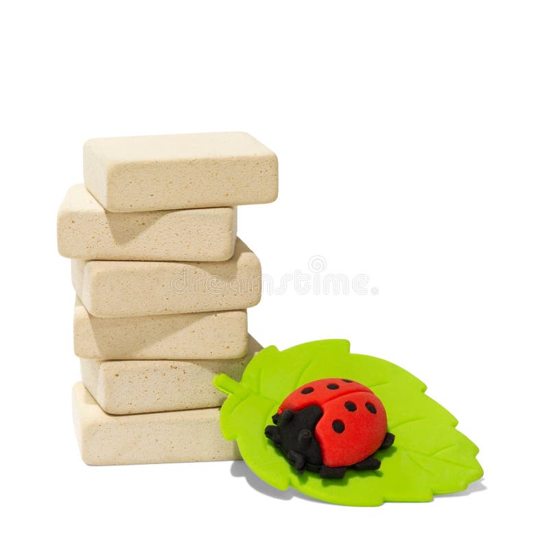 Stack of Uniform Stationery Erasers and Eraser for Kids on White ...