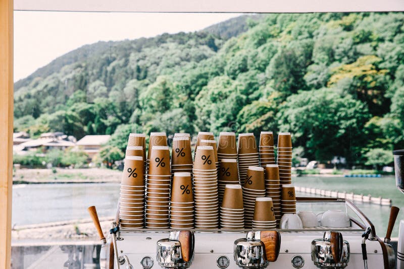 Stack of Upside-down Paper Cups with Percentage Symbol in Coffee Shop ...