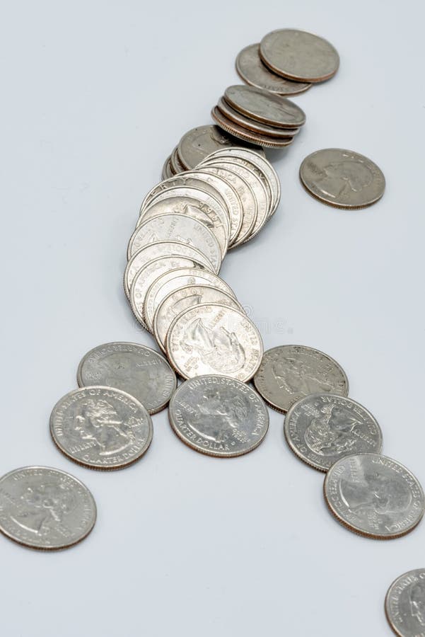 Stack of US Coins Spilled on White Surface Stock Photo - Image of space ...