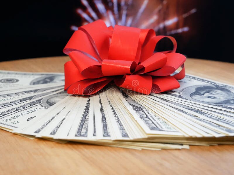 Stack of Usa Dollars and Bow on Fireworks Background, Money Gift ...