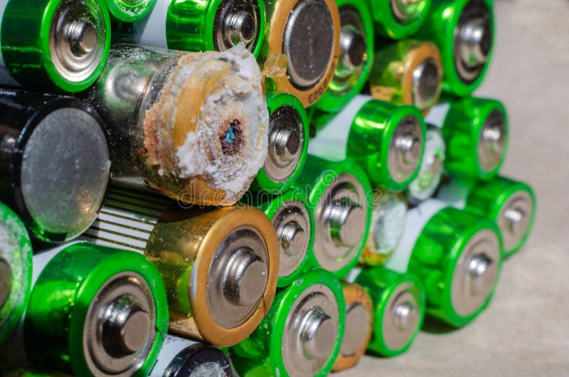 A Stack of Used AAA and AA Size Batteries. Stock Photo - Image of ...