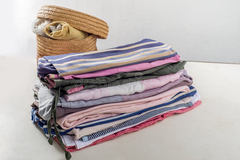 Stack of used clothes. stock photo. Image of colored - 249535286