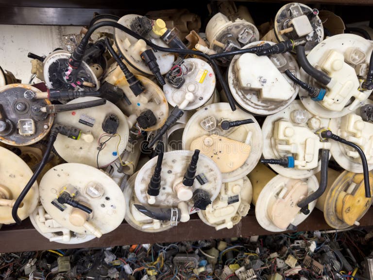 Stack of Used Fuel Pump Assemblies: Pakistan - 03 July 2024 Editorial ...