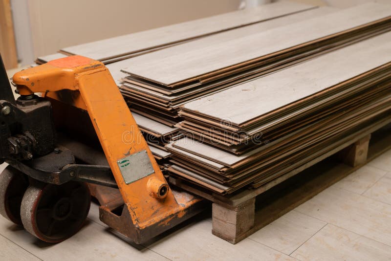 Stack of Used Laminate Flooring Planks on a Pallet. Reclaimed Wood ...