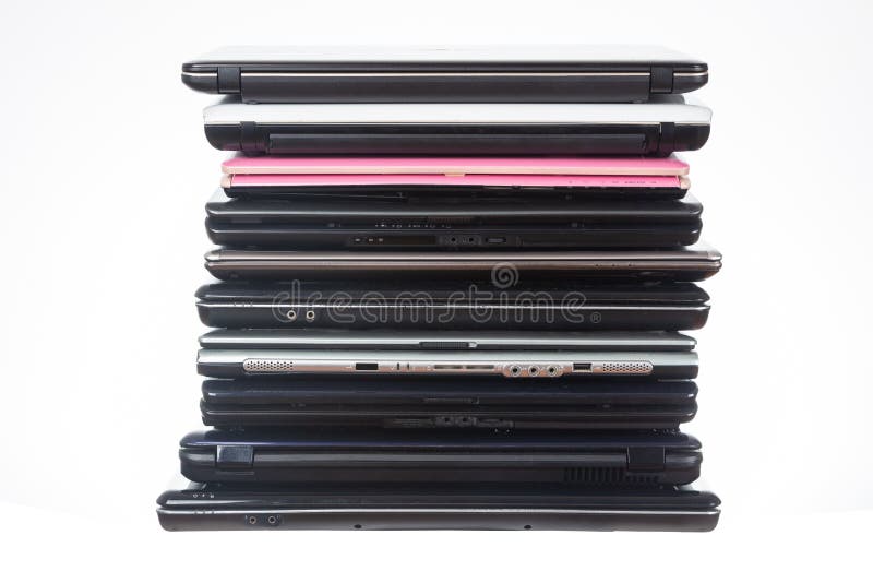 Stack of Used Laptops in Different Colors and Models. T Stock Photo ...