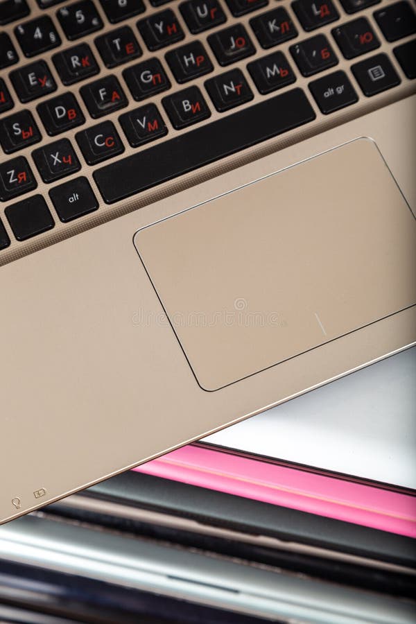 Stack of Used Laptops in Different Colors and Models. T Stock Photo ...