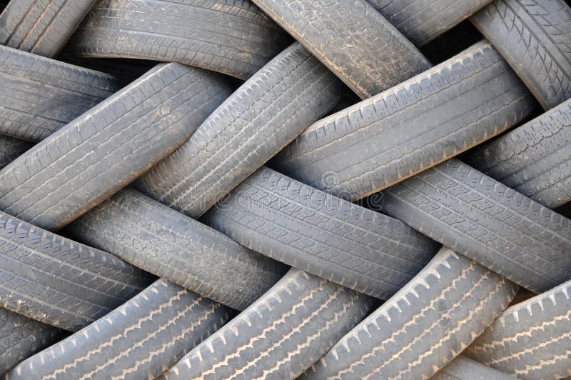 Tyres stacked for reuse stock image. Image of disposal - 28542923