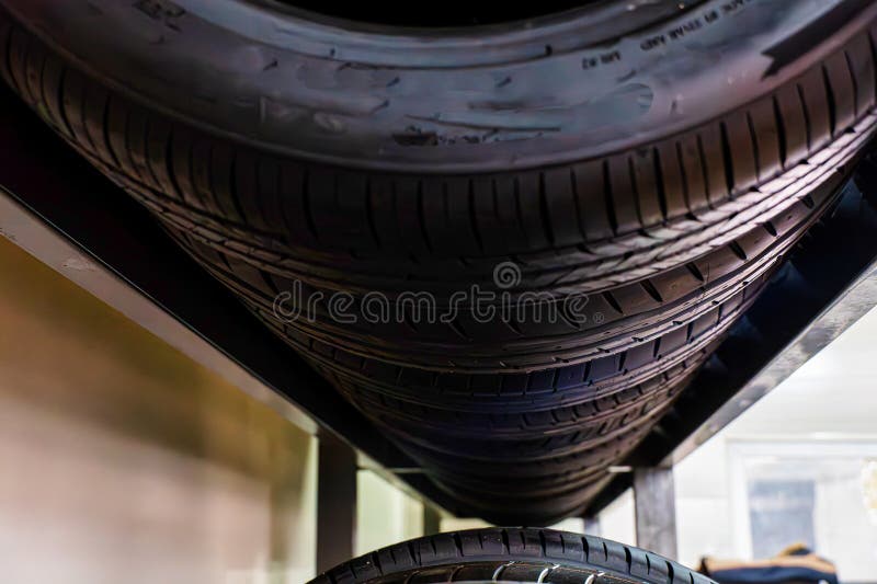 Stacked Tires in a Garage stock image. Image of shelf - 338793237