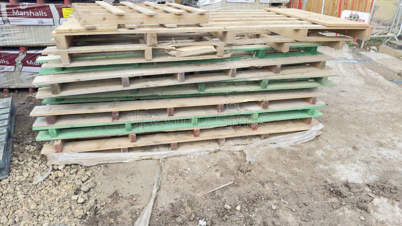 Stack of Used Wooden Pallets on Construction Site Stock Photo - Image ...