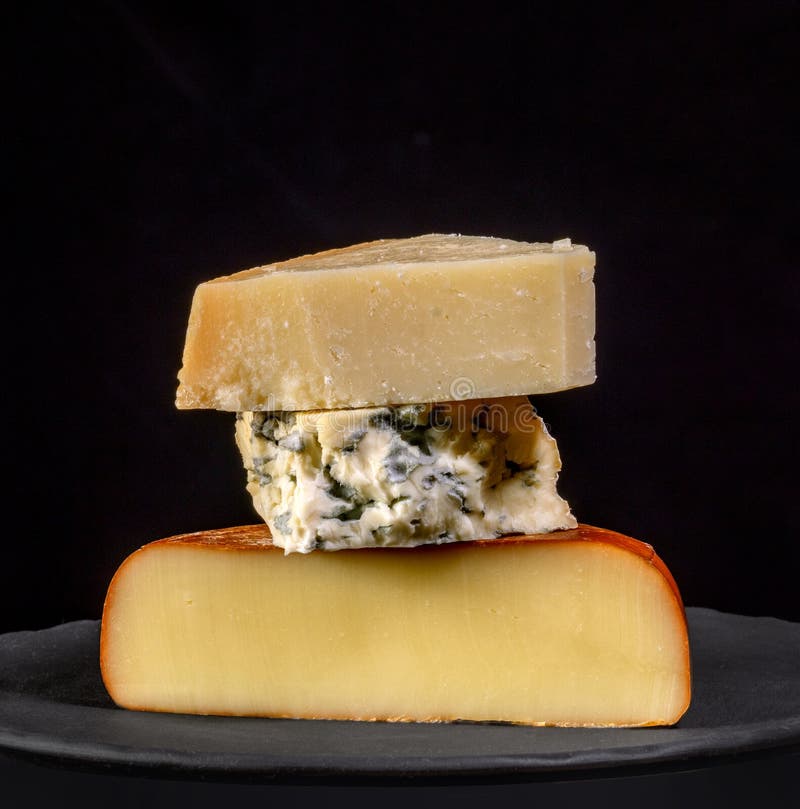 Stack of Various Cheese Pieces Stock Photo - Image of blue, yellow ...