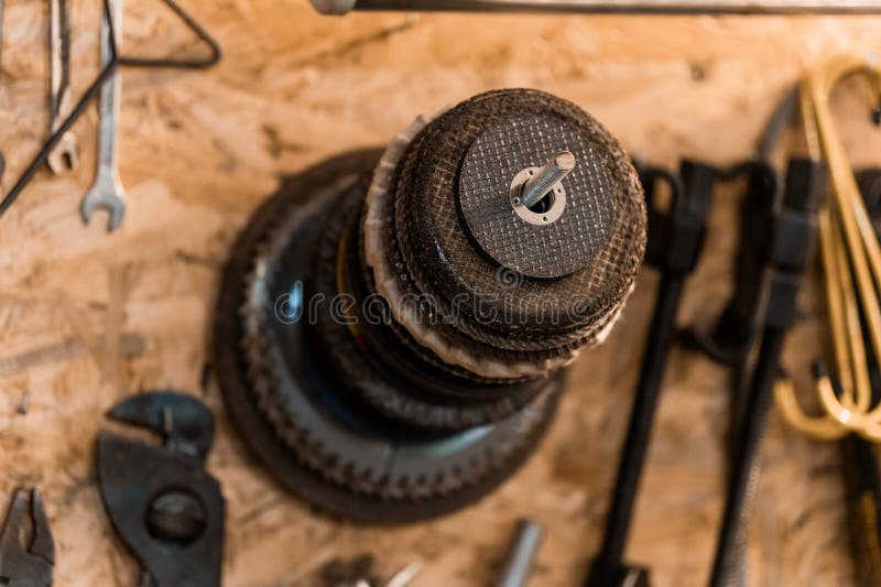 Stack of Various Mechanical Gears and Tools on a Workshop Wall Stock ...