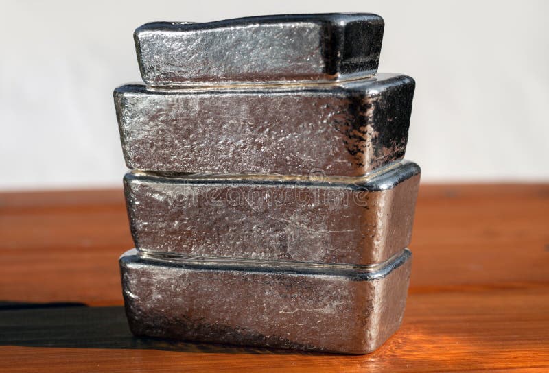 A Stack of Various Silver Bars on a Table. Stock Photo - Image of ...