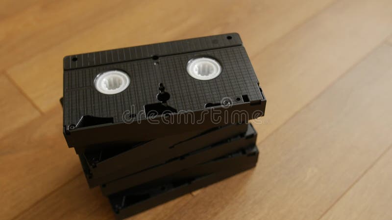 Stack of VHS Video Tape Cassette Over Wooden Background, Top View ...