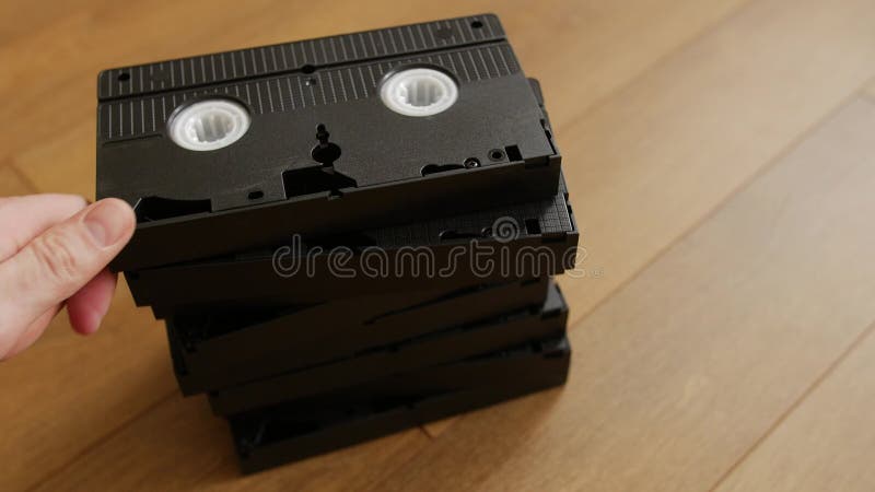 Stack of VHS Video Tape Cassette Over Wooden Background, Top View ...