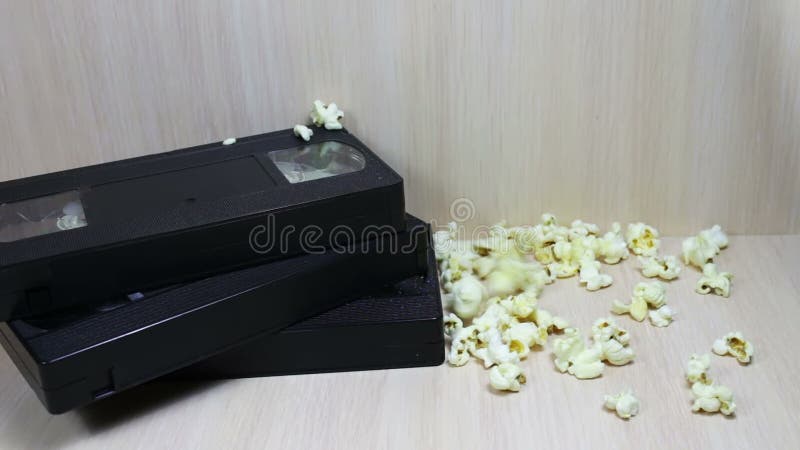 Stack of VHS Video Tape Cassette and Popcorn Stock Video - Video of ...