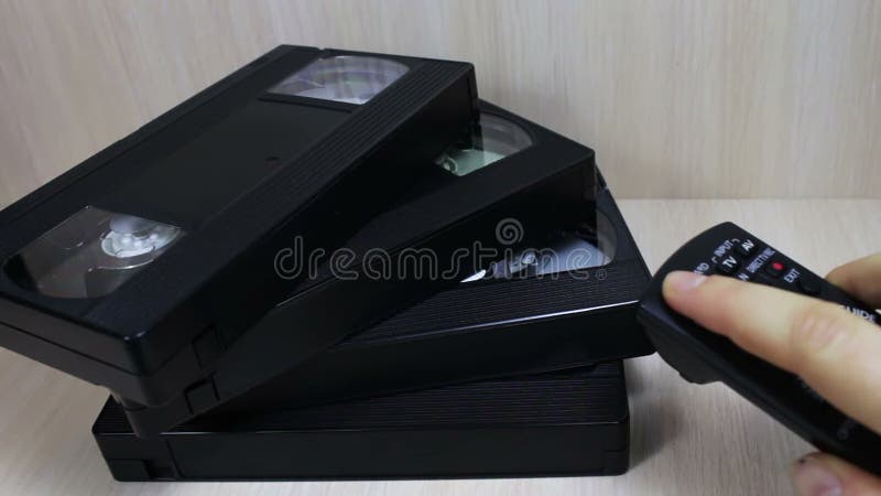 Stack of VHS Video Tape Cassette and Popcorn Stock Footage - Video of ...