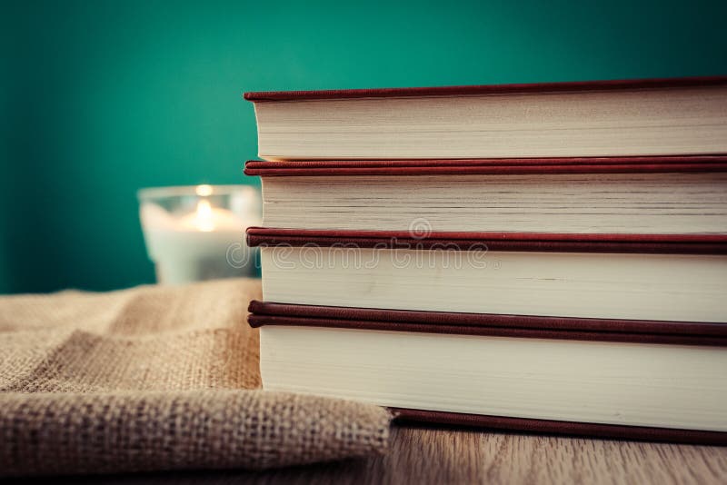 Stack of Vintage Books on a Blue Background Stock Photo - Image of ...