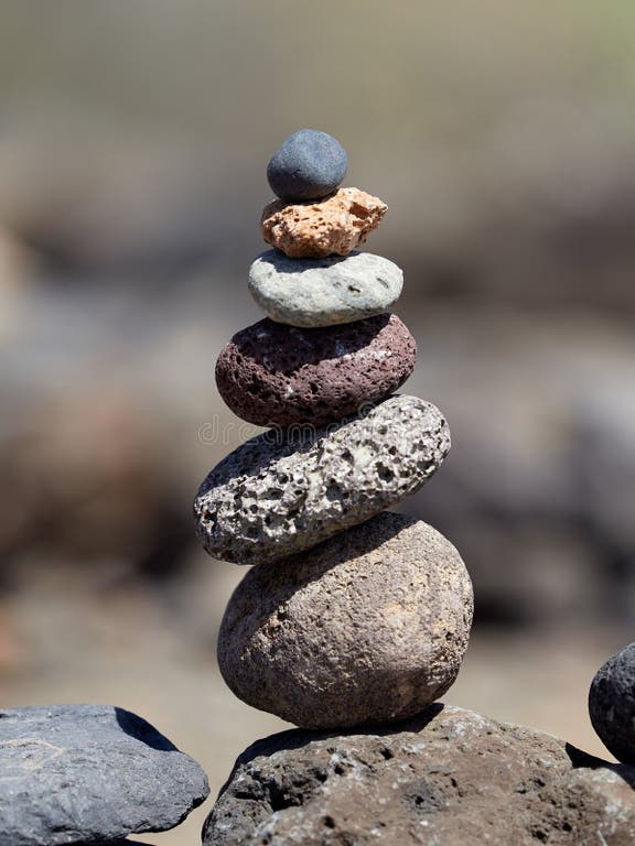 Stack of Volcanic Stones on the Beach Stock Image - Image of colored ...