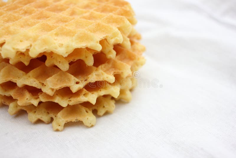 Stack of Waffles on a White Fabric Texture Background. Top View, Copy ...