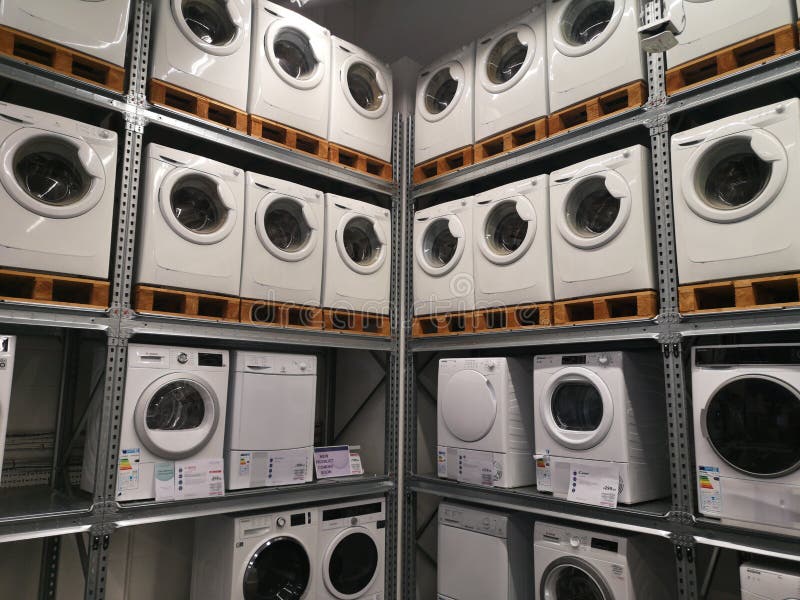 Stack of washing machines editorial stock image. Image of plastic ...