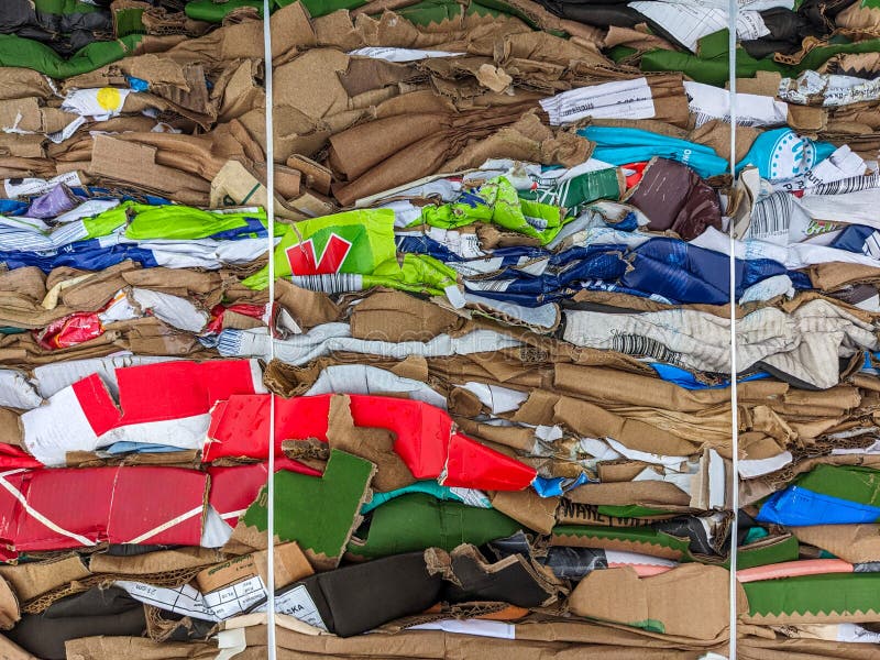 A Stack of Waste Paper from Pressed Cardboard Boxes. Waste Sorting and ...