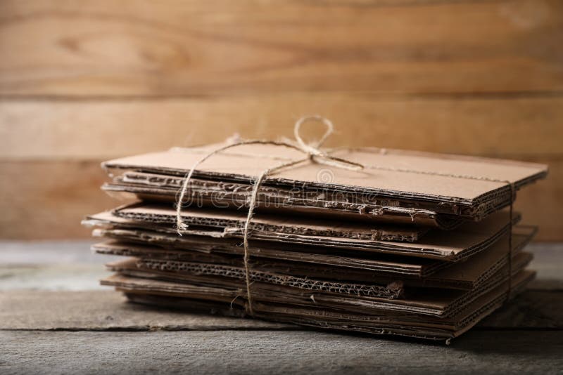 Stack of Waste Paper on Wooden Table, Closeup Stock Image - Image of ...