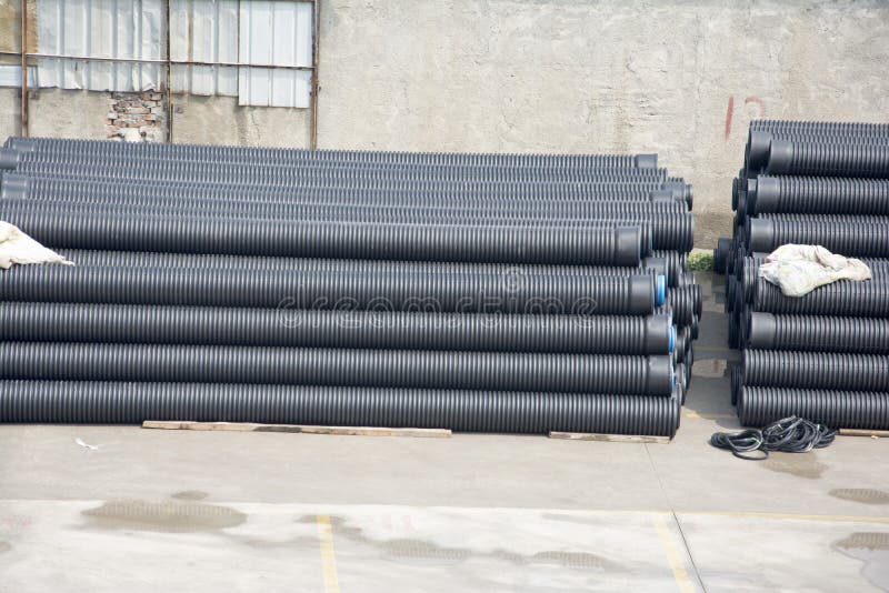 Black drainage pipes stock photo. Image of flowing, land - 161327044