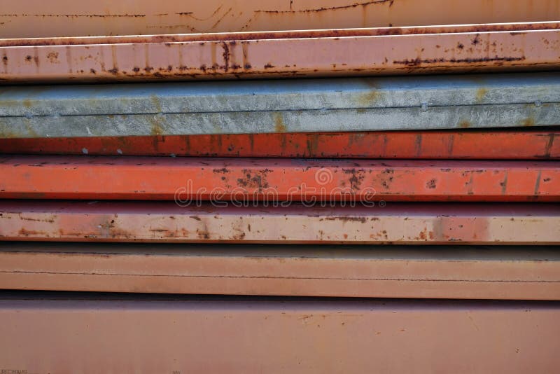 Stack of Weathered Metal Plates in Various Colors Stock Image - Image ...
