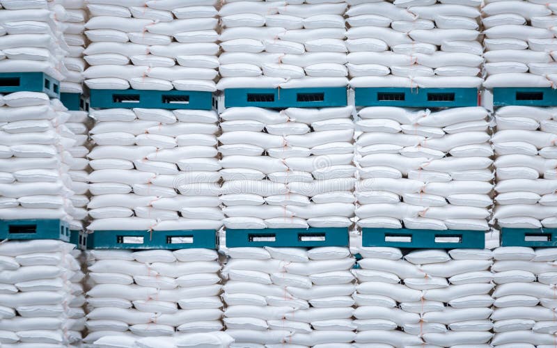 Bags of Sugar in the Warehouse. a Wall of Sugar Sacks in a Large ...