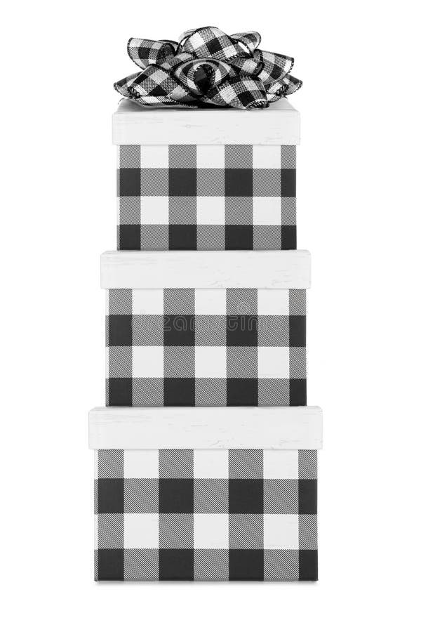 Stack of White and Black Check Christmas Gift Boxes Isolated on White ...