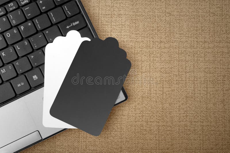 Stack of the White and Black Label Tag on the Laptop Stock Image ...