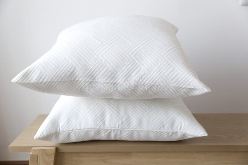 Stack of Cushions on the Floor Against Bokeh Lights and Brown ...