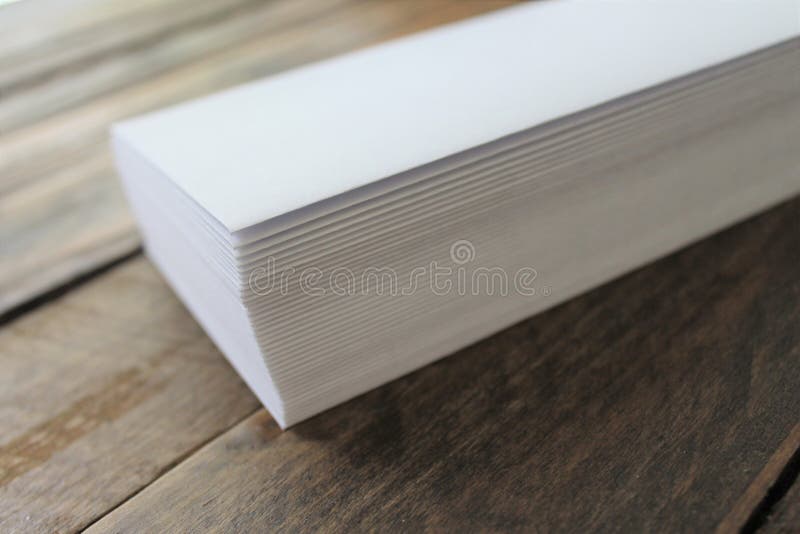 Stack of White Envelopes on a Wooden Background Isolated Stock Photo ...