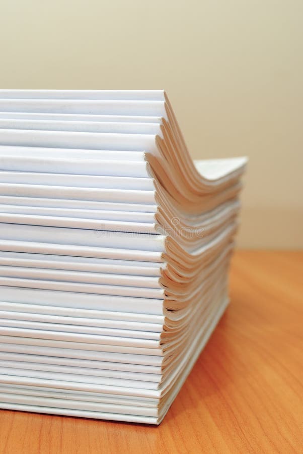 Stack of white journals stock photo. Image of stacking - 12593682
