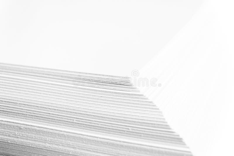 Stack of White Paper. Blurring Background. the Corners of Sheets of ...