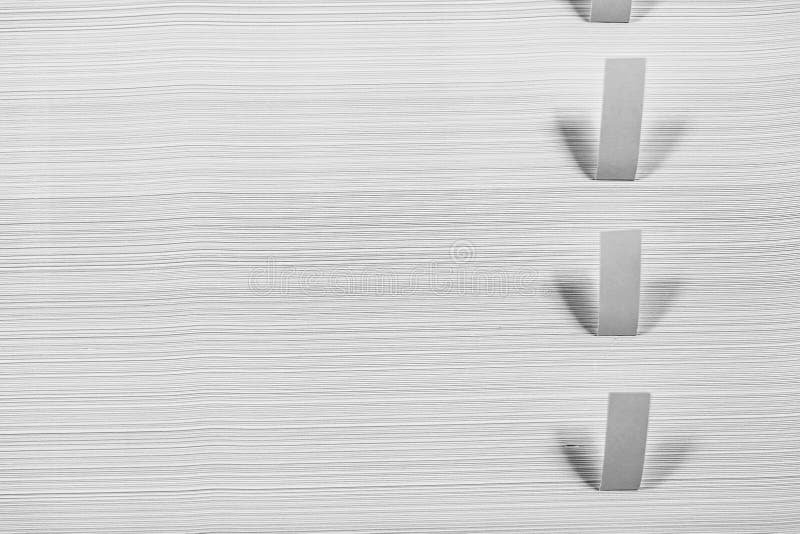 A Stack of White Paper with Bookmarks. Paper Texture Background Stock ...