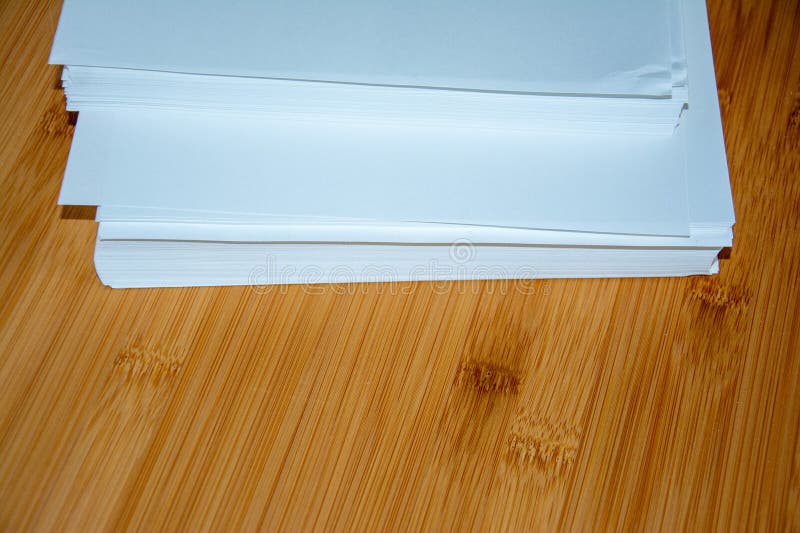 Stacking of White Paper on a Wooden Tabletop Stock Image - Image of ...